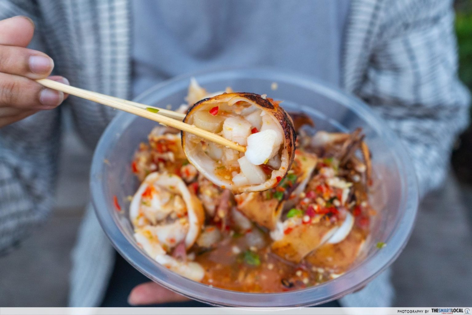 Jumbo Pla Muek Yang Sells Giant Grilled Squid With Spicy Seafood Sauce
