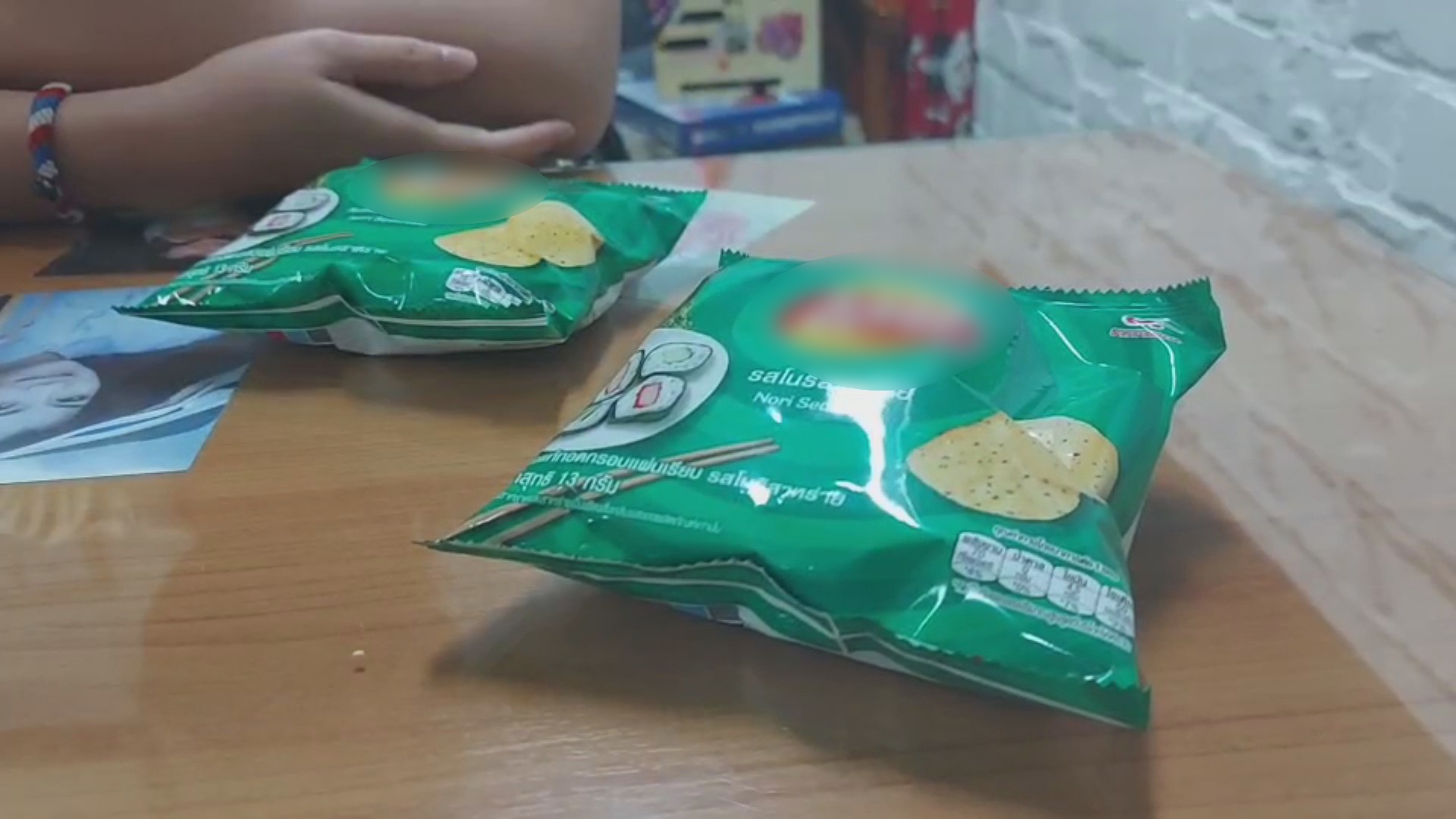 Woman's Lay's Bag Contains 0 Crisps, But 1 Seaweed Flake
