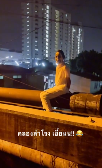 Ghost Spotted Sitting On Bridge, Turns Out To Be A Human Wearing Mask