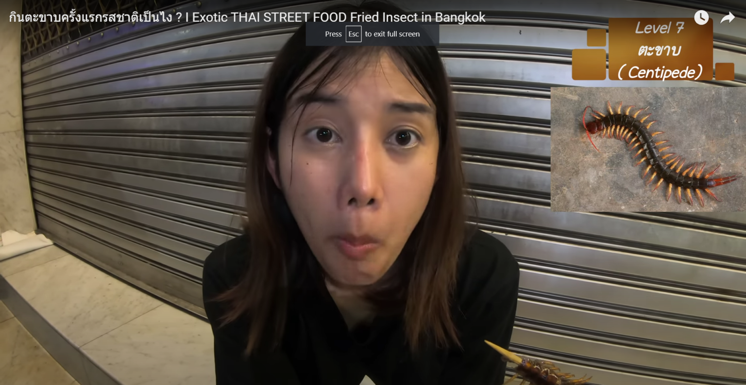 Woman Shows Eating Fried Centipede At Yaowarat